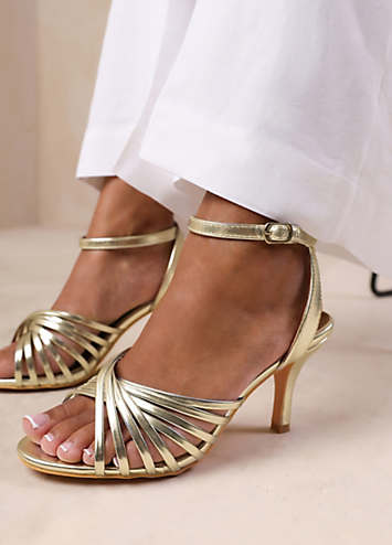 Cyprus Wide Fit Multi Cross Over Strap Mid Heels in Gold Faux Leather ...