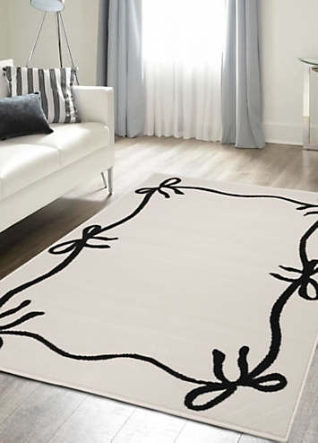 Maestro Bow Border Rug by The Homemaker Rugs Collection | Look Again