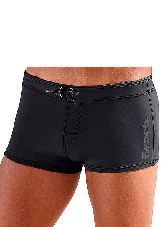 Boxer Swimming Trunks by Bench | Look Again